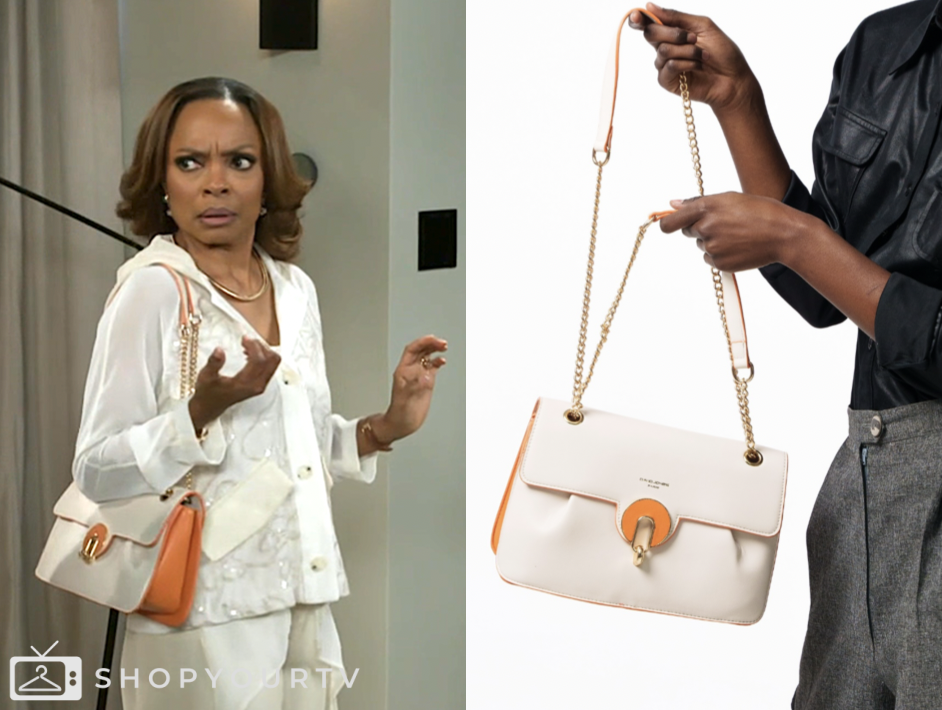 Beyond the Gates: July 2025 Tracy Tyler’s White and Orange Chain Strap ...