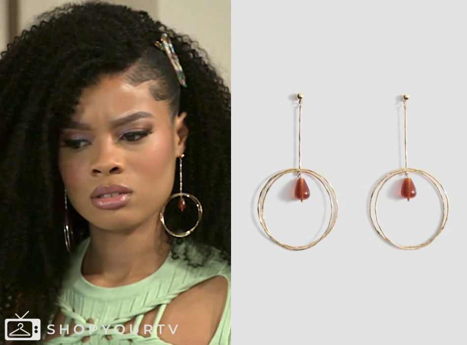 Beyond the Gates: July 2025 Eva Thomas's Gold and Red Hoop Drop ...