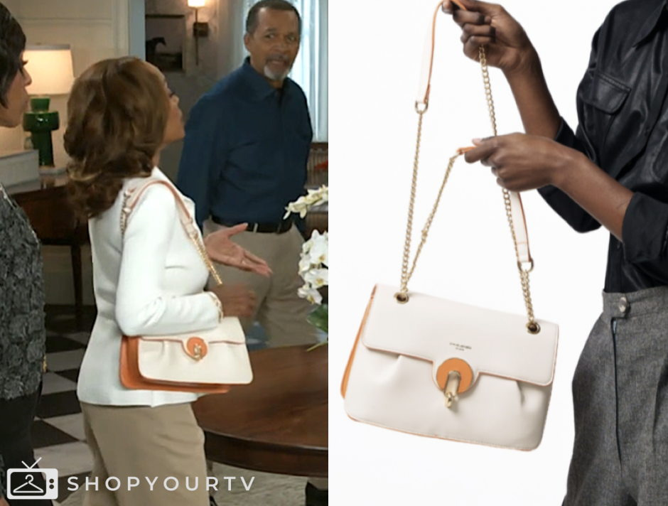 Beyond the Gates: July 2025 Tracy Tyler’s White and Orange Chain Strap ...