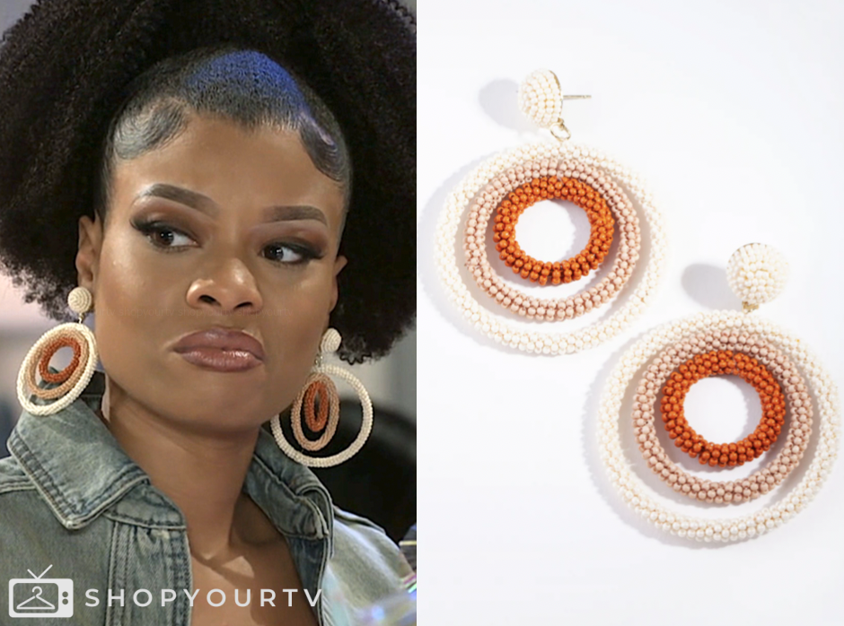 Beyond the Gates: September 2025 Eva Thomas's White and Orange Beaded ...